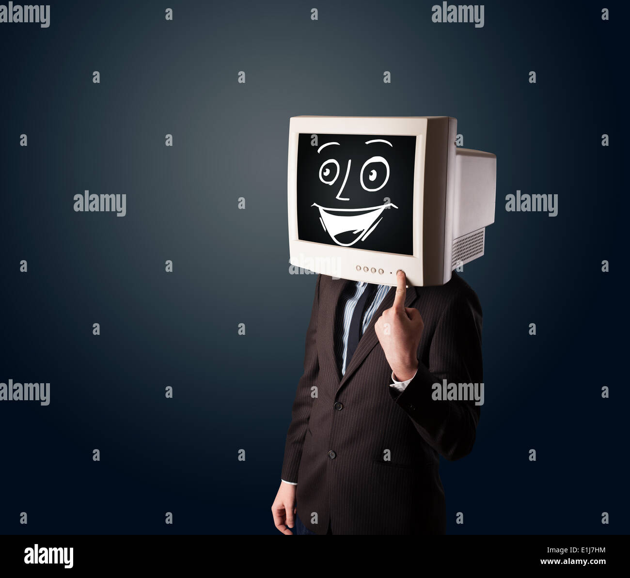Happy businessman with a PC monitor head and a smiley face Stock Photo ...