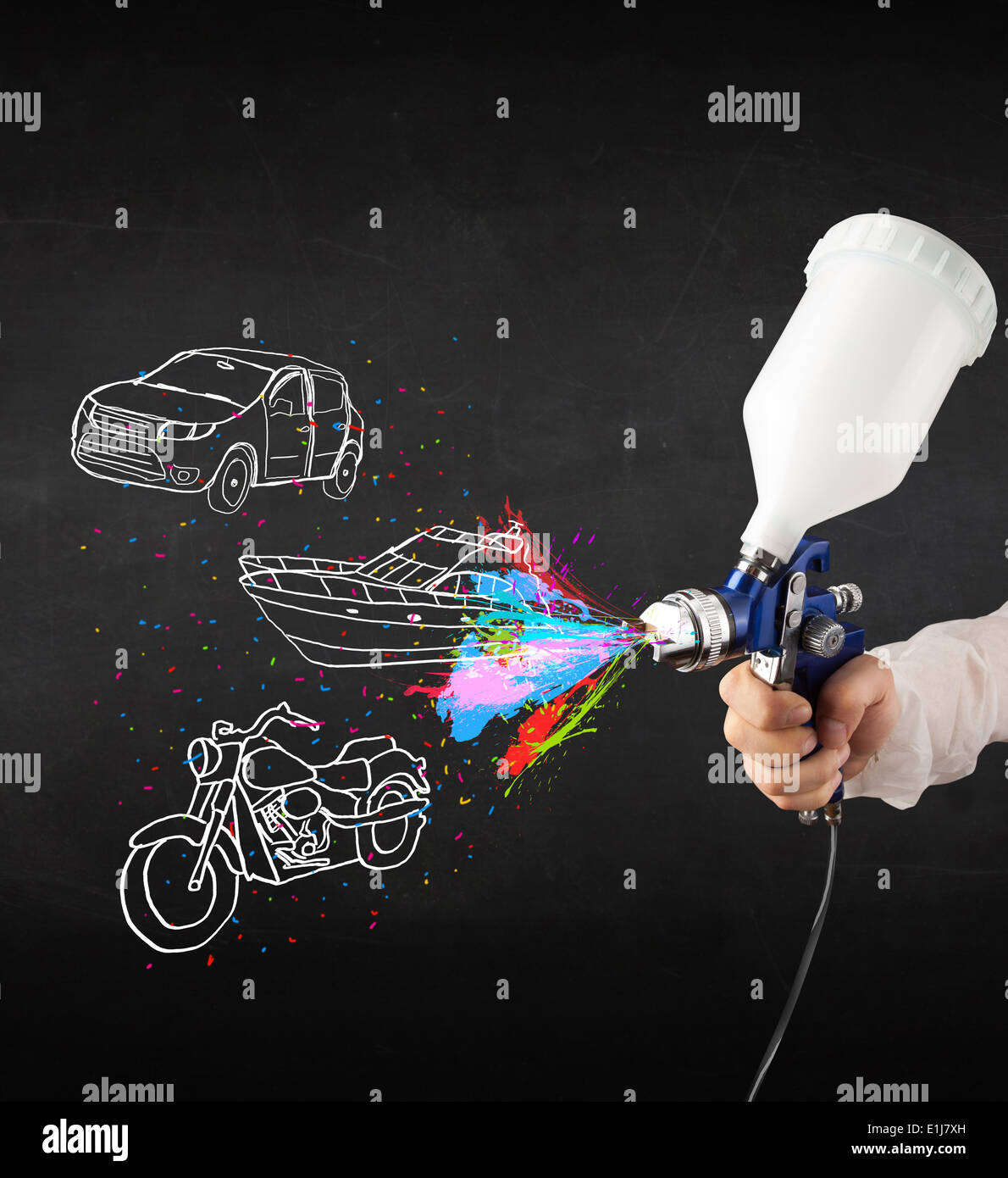 Man with airbrush spray paint with car, boat and motorcycle drawing ...