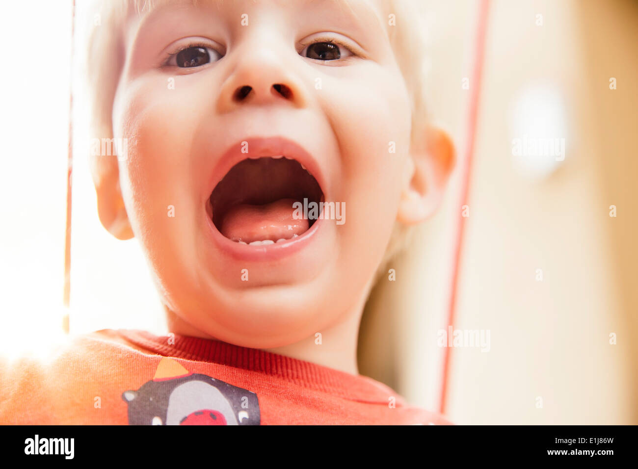Little boy showing his mouth, close-up Stock Photo - Alamy