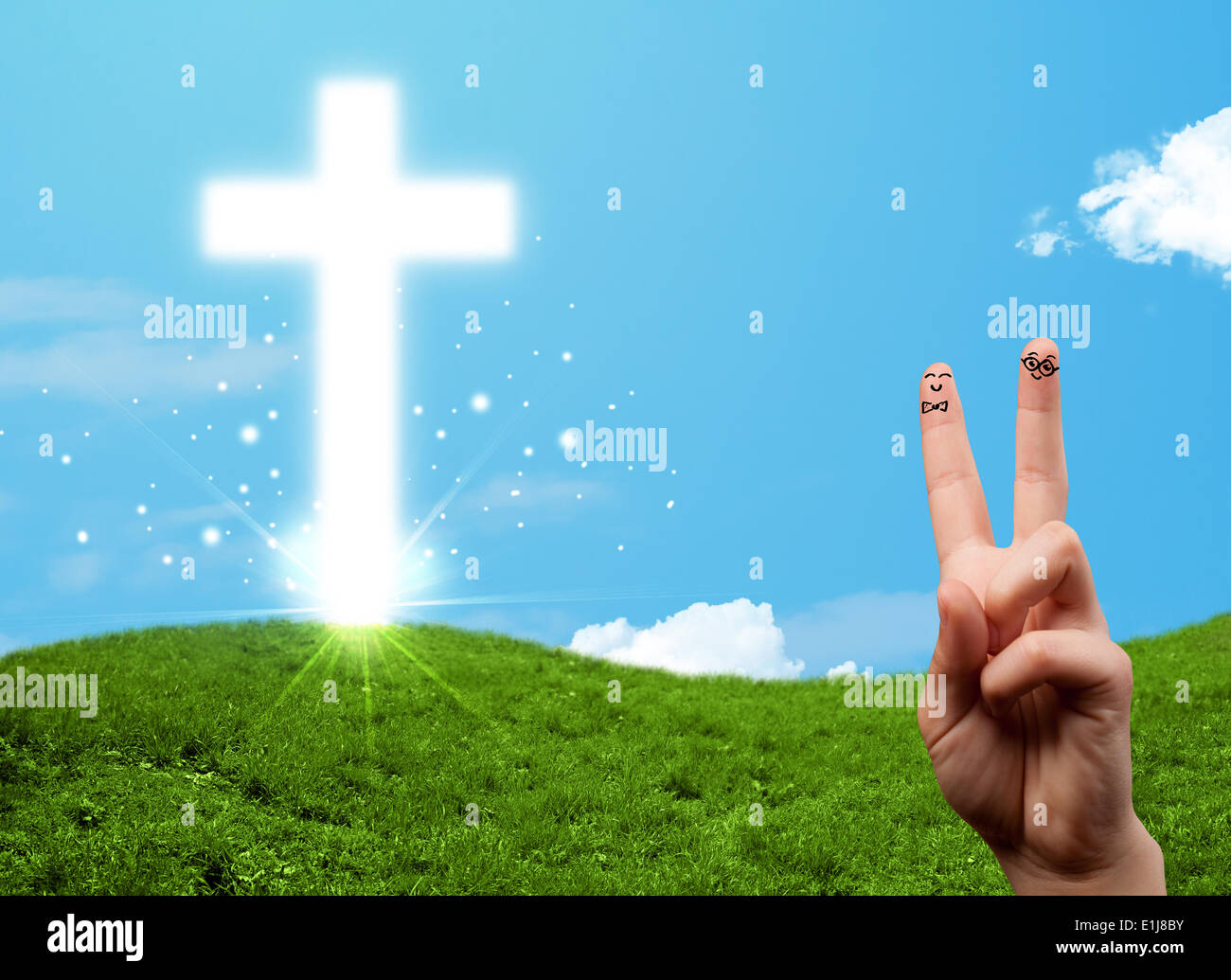 Happy finger smileys with christian religion cross Stock Photo - Alamy
