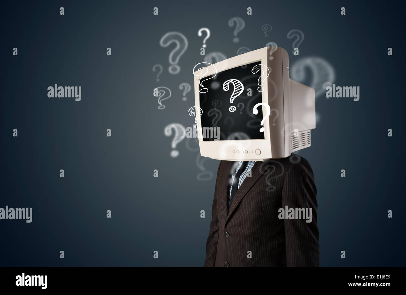 Businessman with a computer monitor head and question marks Stock Photo ...