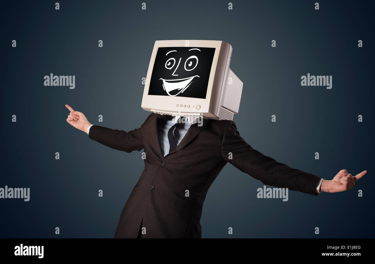 Happy businessman with a PC monitor head and a smiley face Stock Photo ...