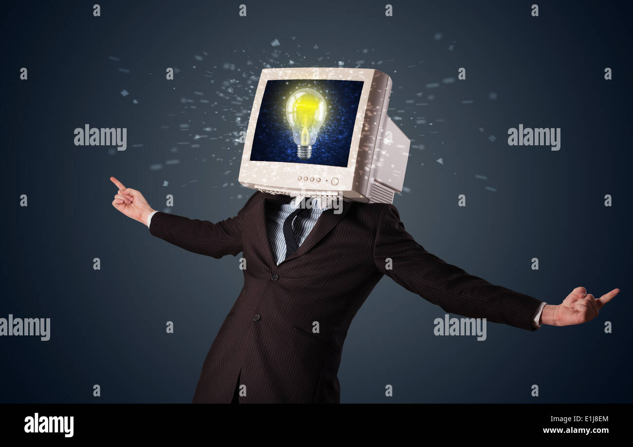 Business man with a pc monitor head and idea light bulb in the display ...