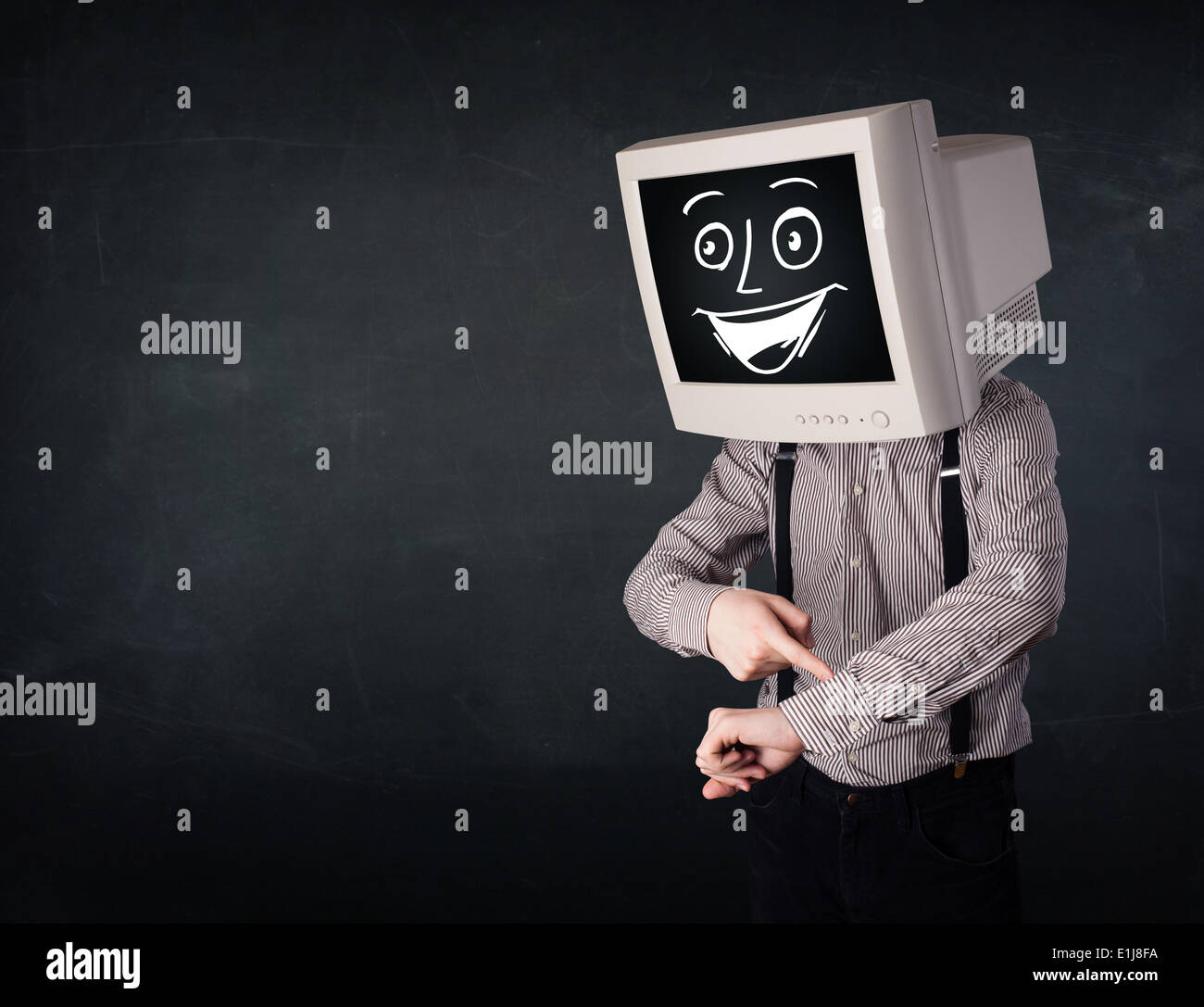 Happy businessman with a PC monitor head and a smiley face Stock Photo ...