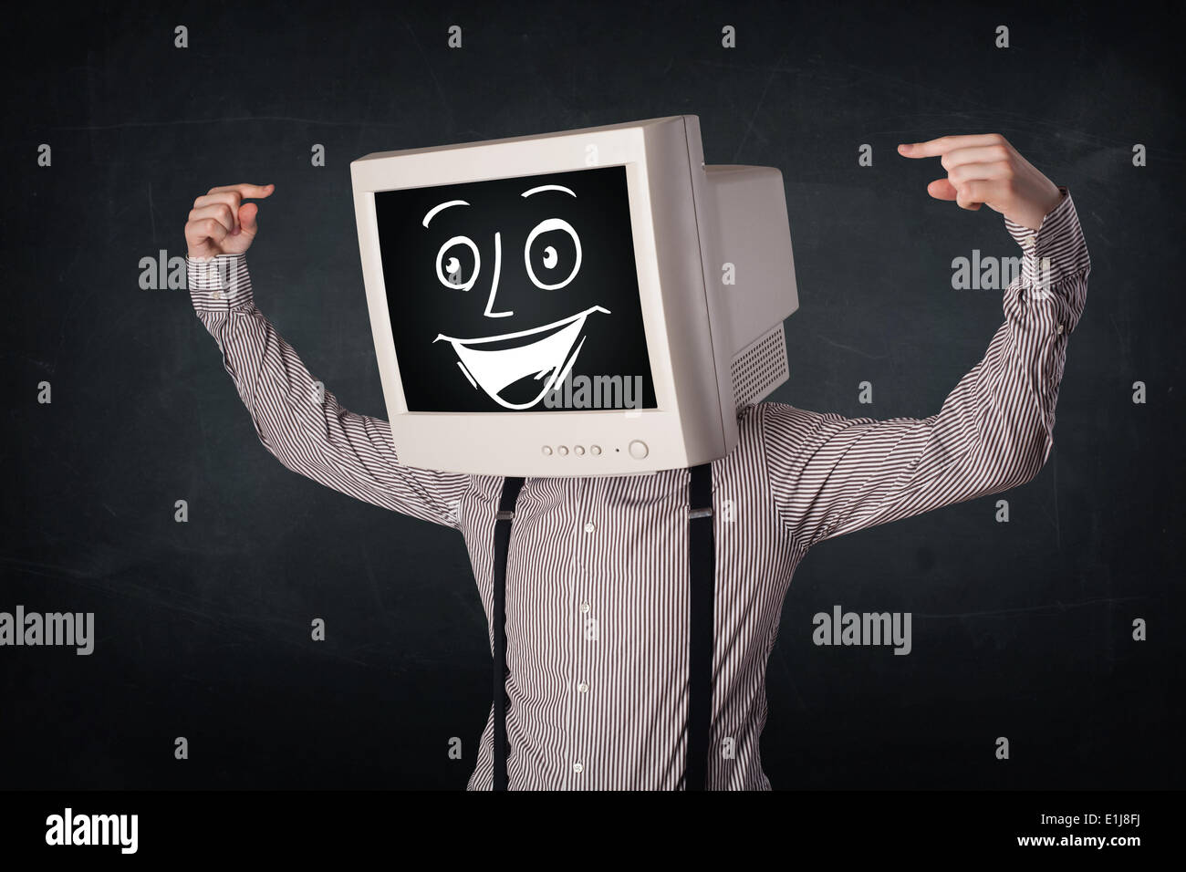 Happy businessman with a PC monitor head and a smiley face Stock Photo ...