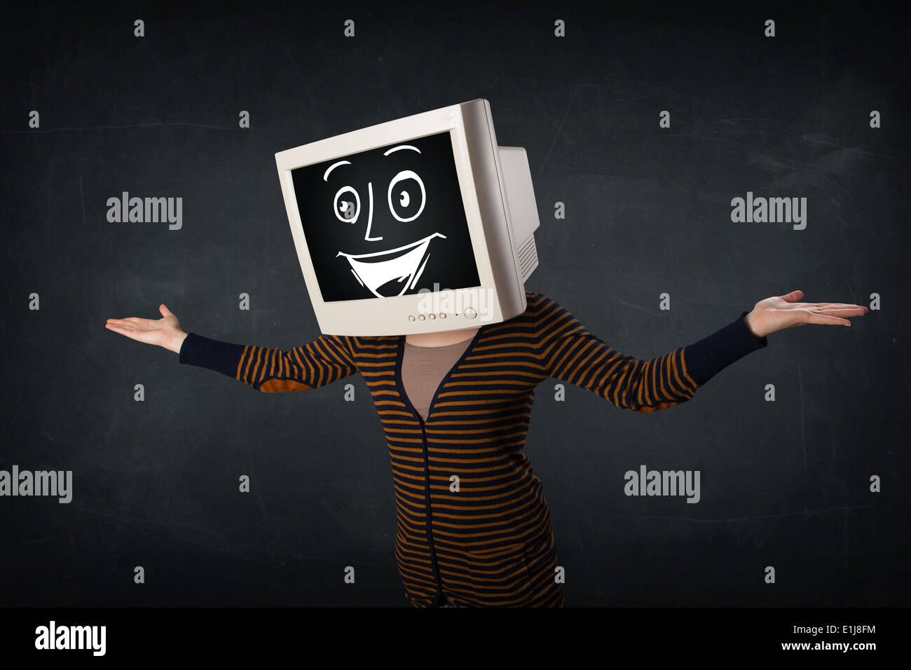 Girl with a monitor head and a cheerful cartoon face Stock Photo - Alamy