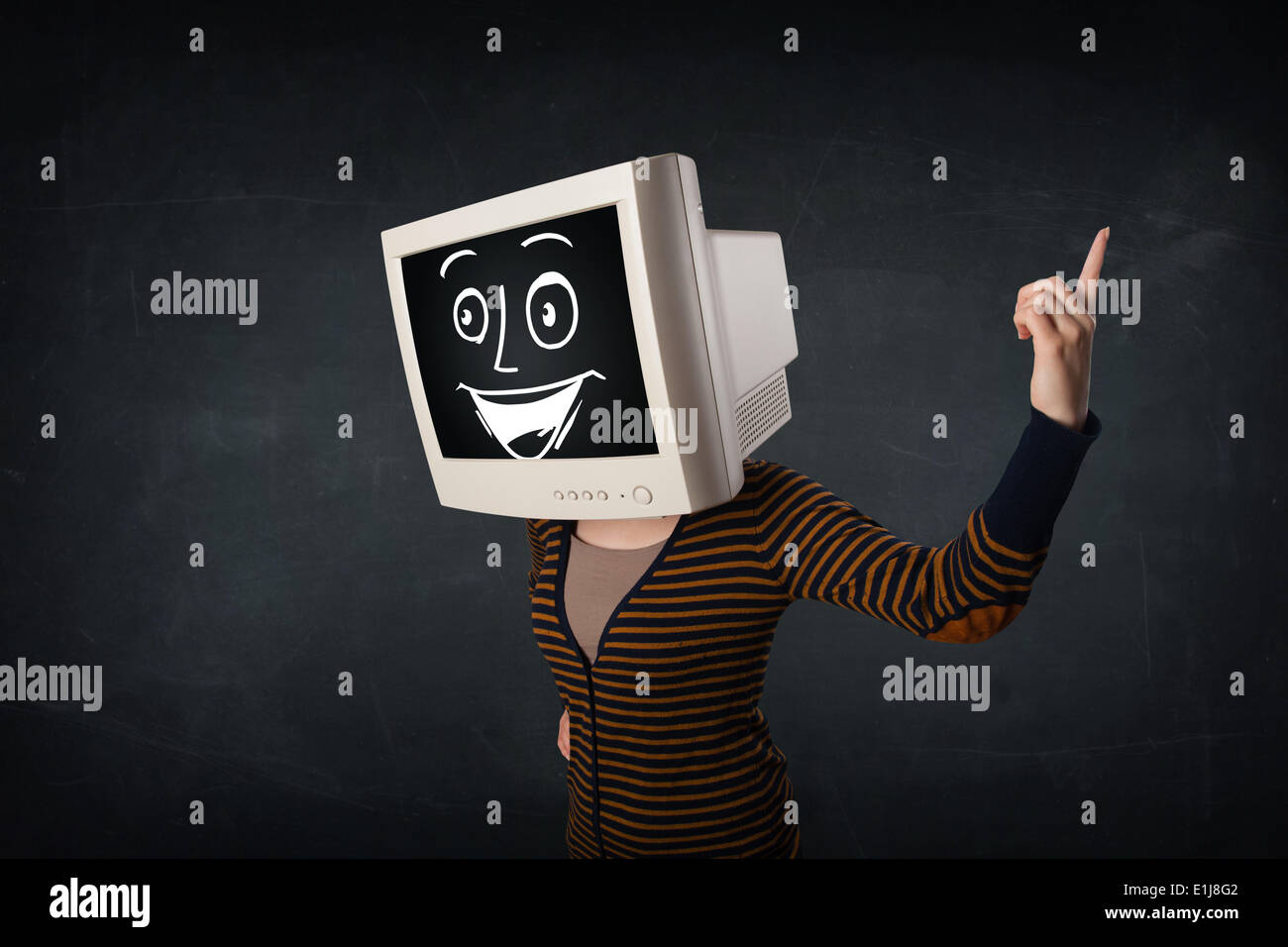 Girl with a monitor head and a cheerful cartoon face Stock Photo - Alamy