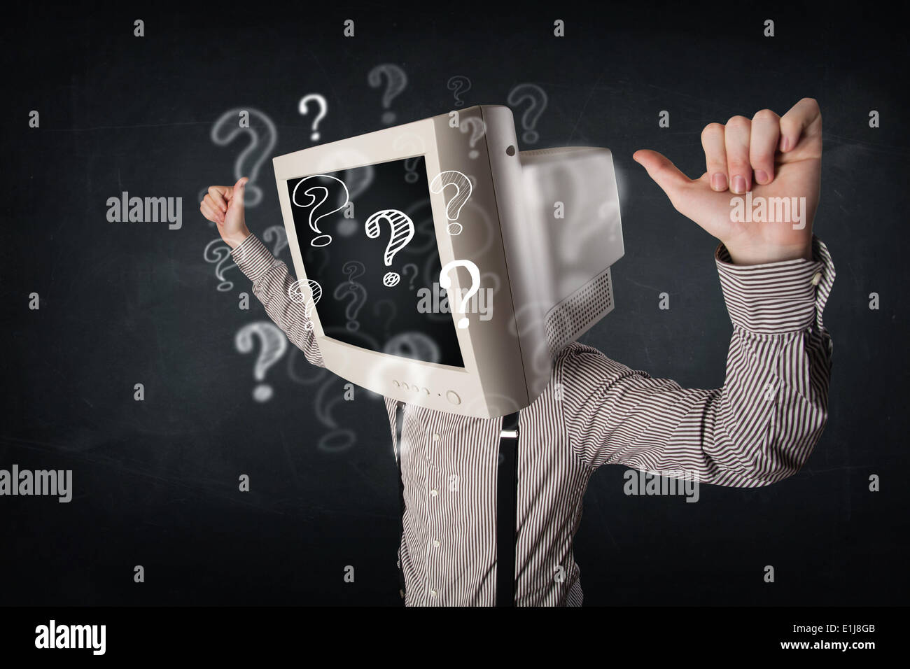 Businessman with a computer monitor head and question marks Stock Photo ...