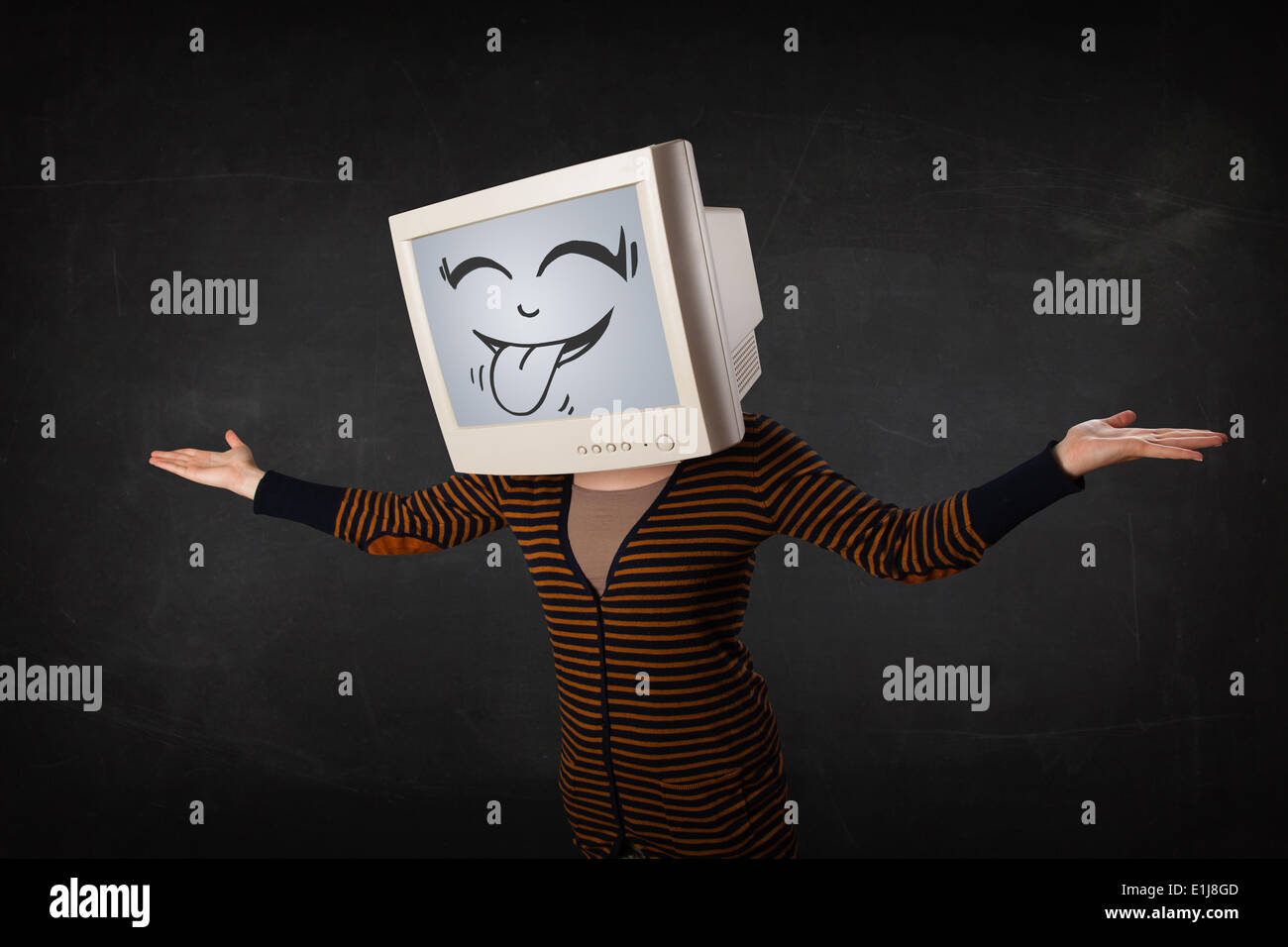 Young girl wearing a monitor with a funny face Stock Photo - Alamy