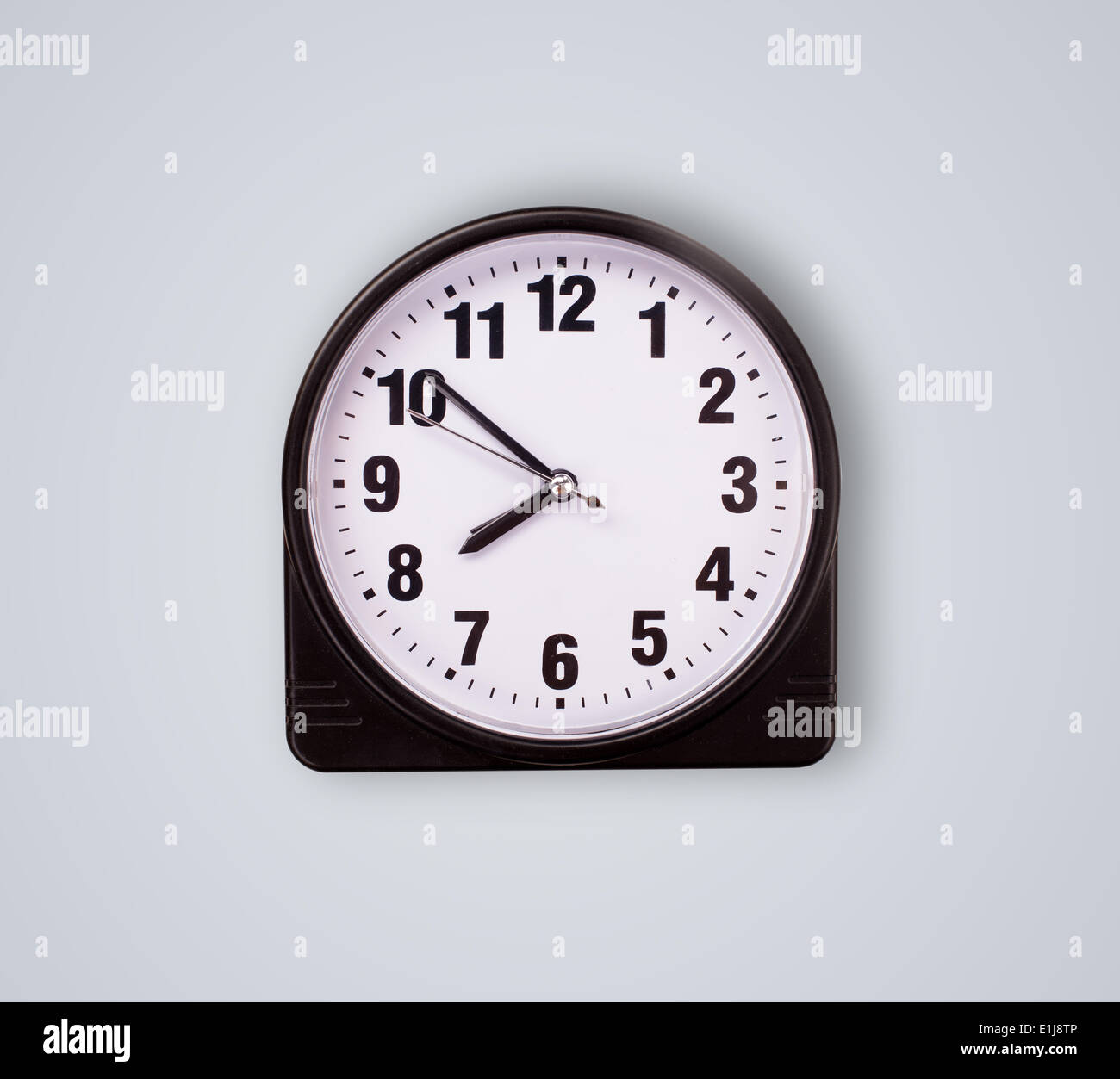 Modern clock with hours and minutes Stock Photo - Alamy