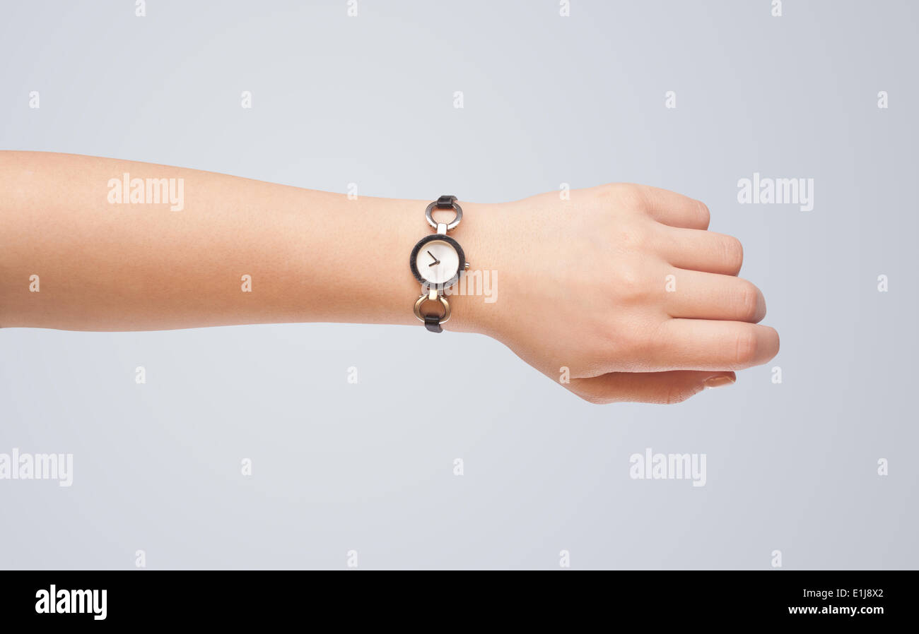 Hand with watch showing precise time Stock Photo - Alamy