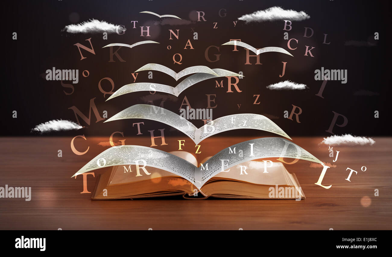 Pages and glowing letters flying out of a book Stock Photo - Alamy