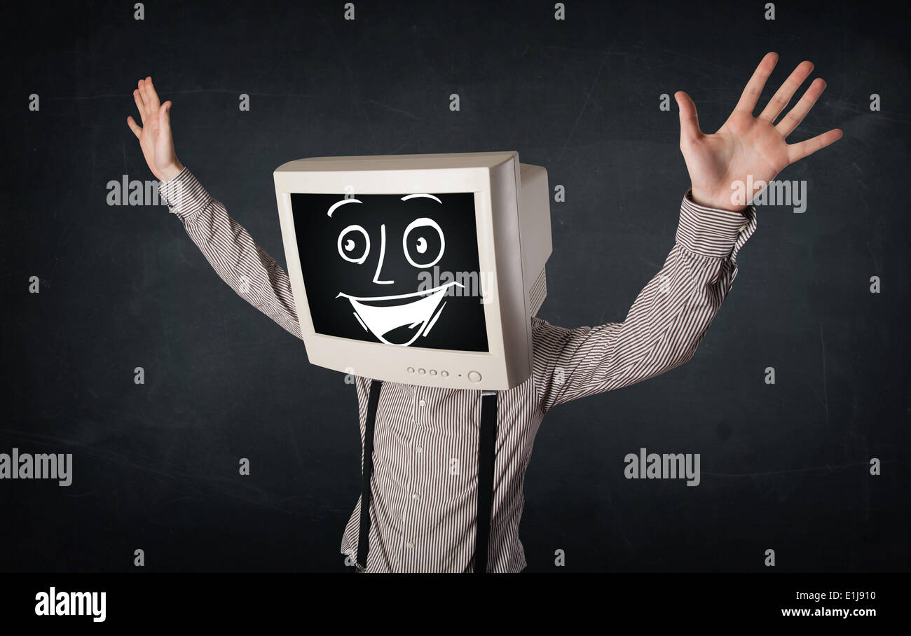Happy businessman with a PC monitor head and a smiley face Stock Photo ...