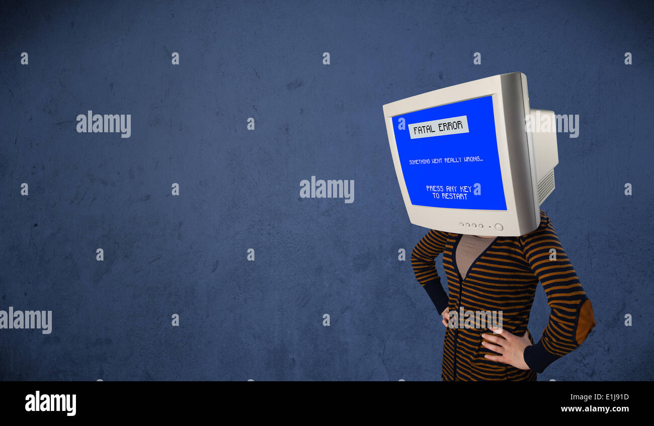 Person with a monitor head and fatal error blue screen on the display ...