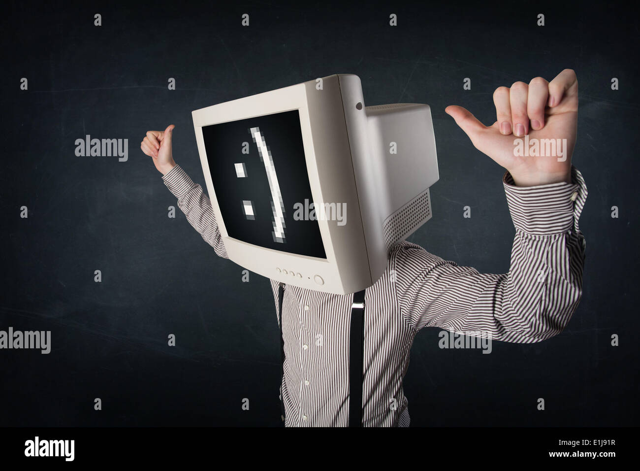 Funny young businessman with a monitor on his head and smiley on the ...