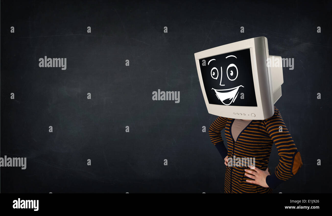 Girl with a monitor head and a cheerful cartoon face Stock Photo - Alamy