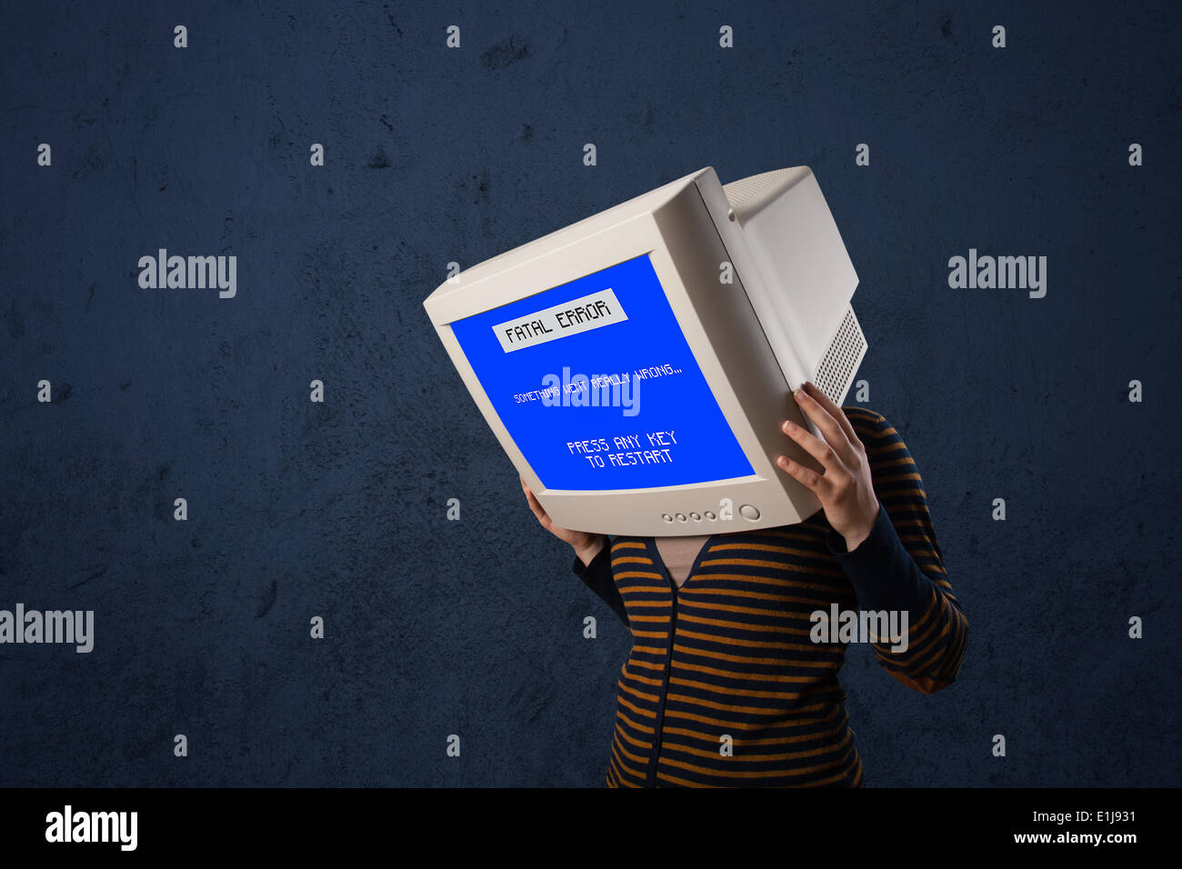 Person with a monitor head and fatal error blue screen on the display ...
