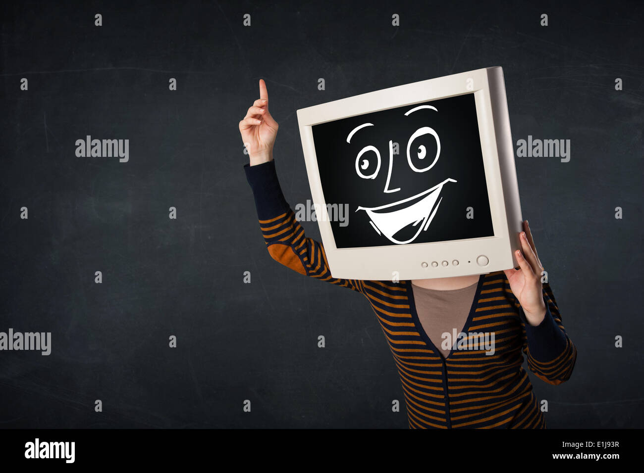 Girl with a monitor head and a cheerful cartoon face Stock Photo - Alamy