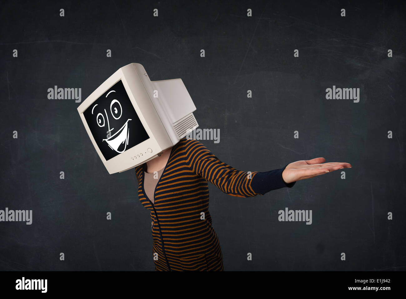 Girl with a monitor head and a cheerful cartoon face Stock Photo - Alamy