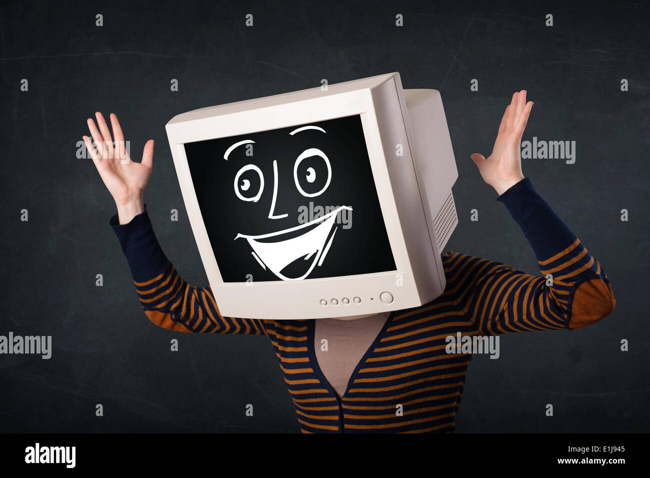 Girl with a monitor head and a cheerful cartoon face Stock Photo - Alamy