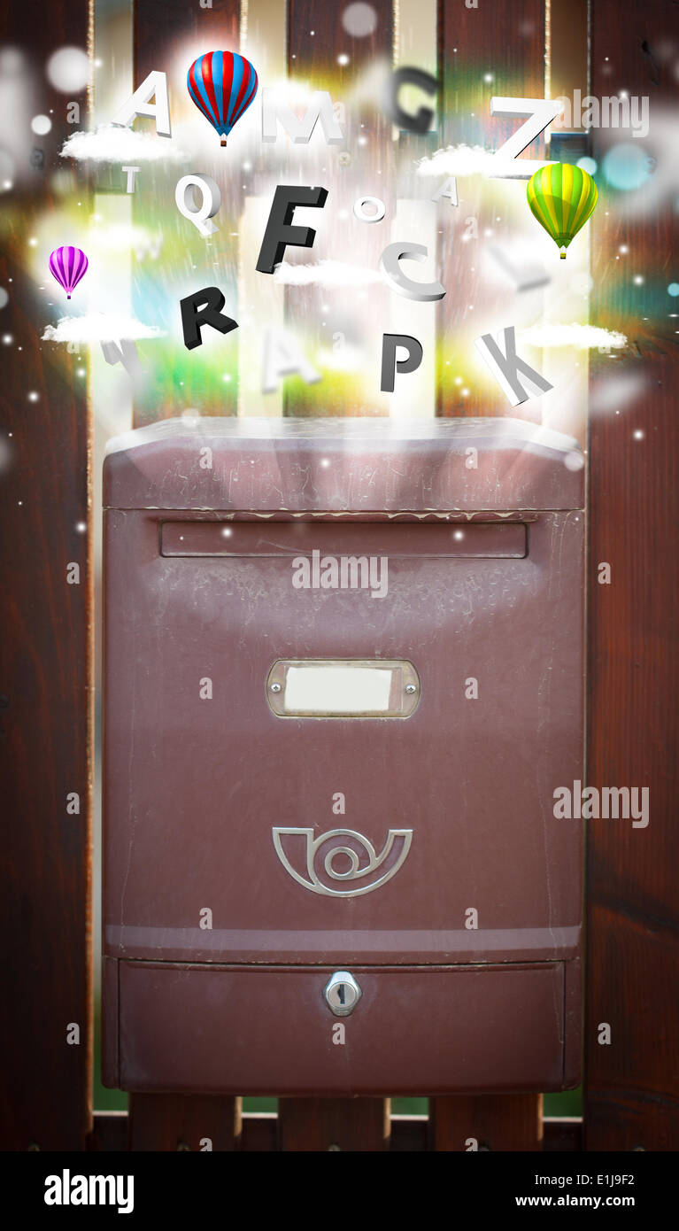 Post box with colorful letters Stock Photo - Alamy