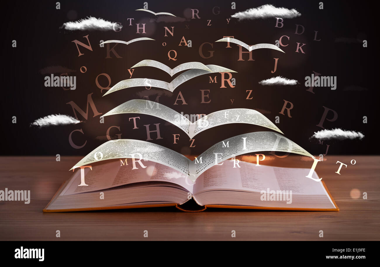 Pages and glowing letters flying out of a book Stock Photo - Alamy