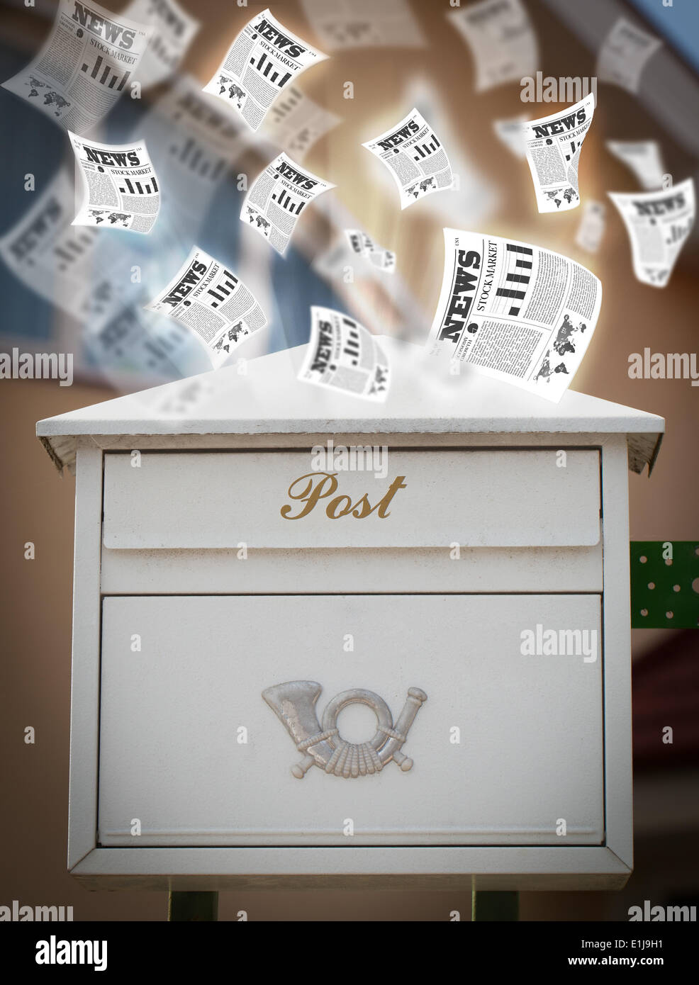 Post box with daily newspapers flying Stock Photo - Alamy
