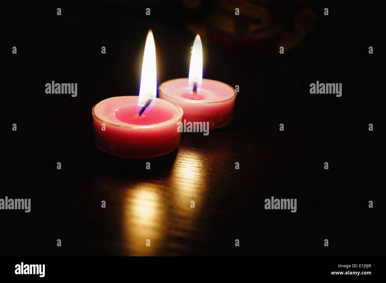 Closeup lit candle bright flame hi-res stock photography and images - Alamy