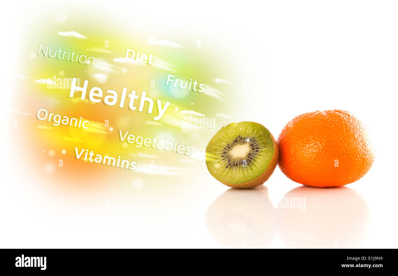 Colorful juicy fruits with healthy text and signs Stock Photo - Alamy