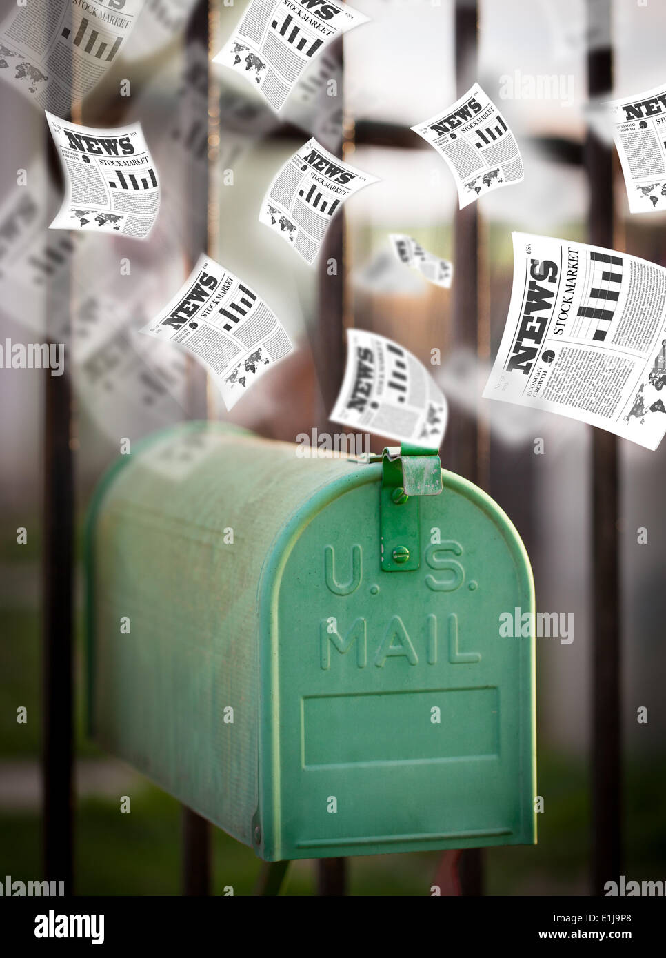 Post box with daily newspapers flying Stock Photo - Alamy