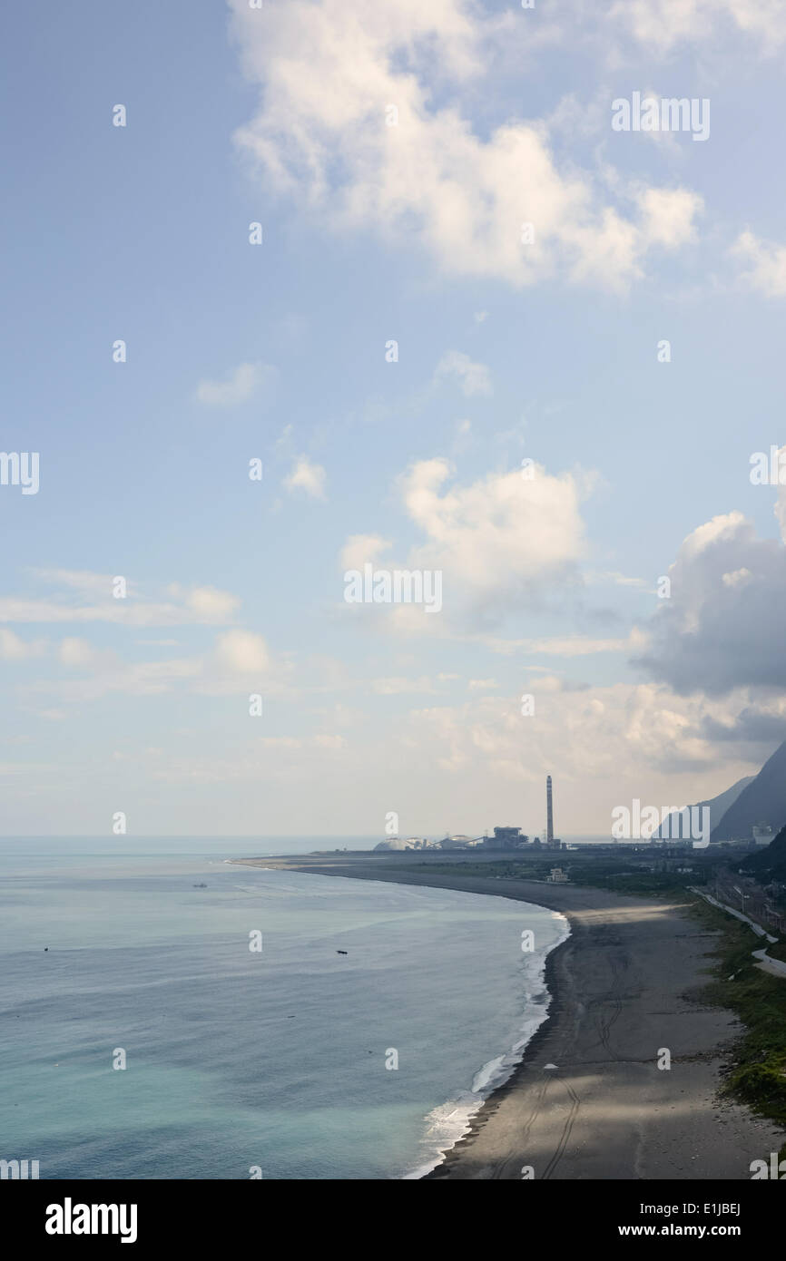 Factory located at the Beach Stock Photo - Alamy
