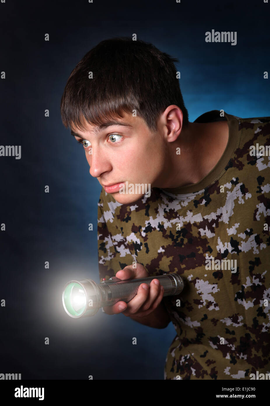 Teenager with Flashlight Stock Photo - Alamy