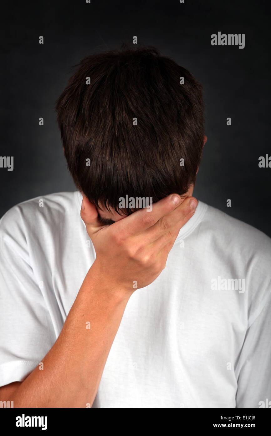 Sad Young Man Stock Photo - Alamy