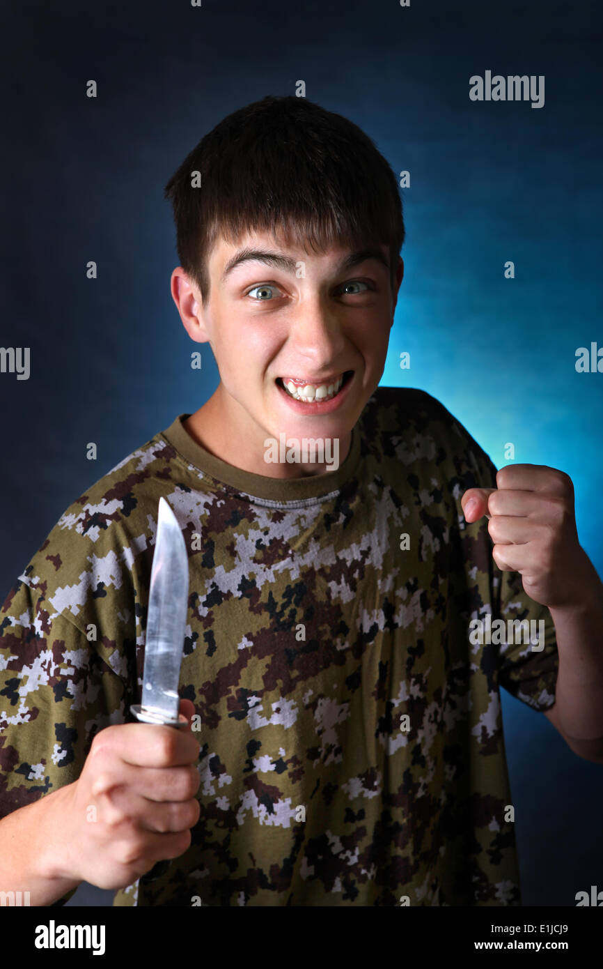 Angry Teenager with Knife Stock Photo - Alamy