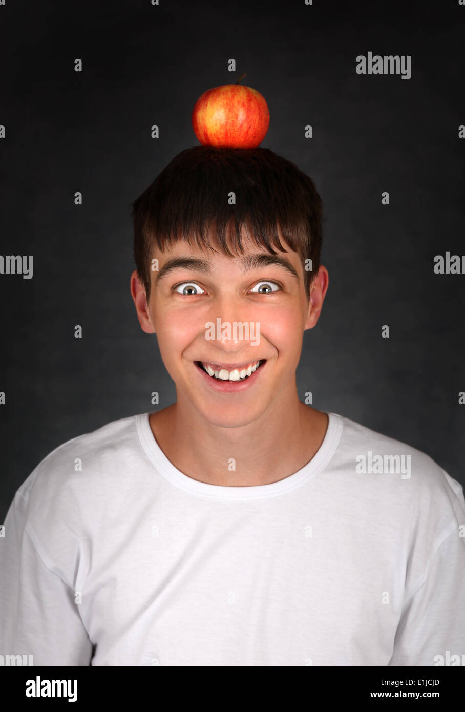 Apple on the Head Stock Photo - Alamy