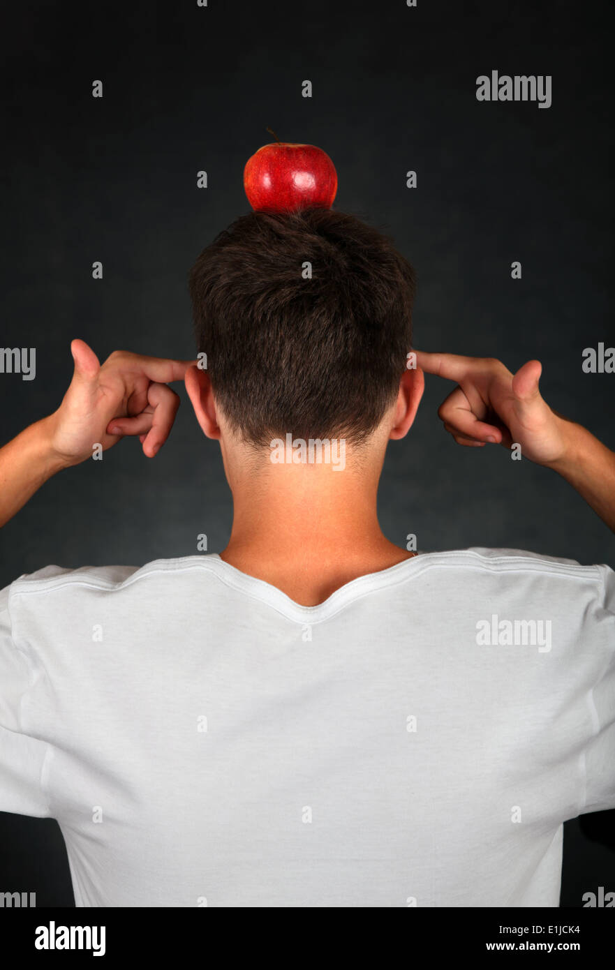 Apple on the Head Stock Photo - Alamy