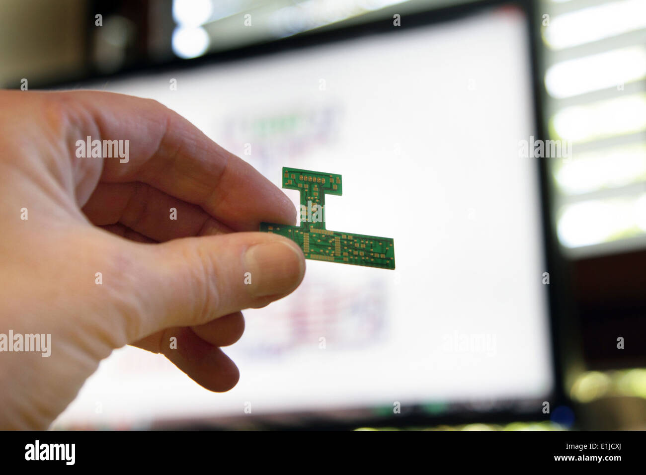 Hand holding electronic component hi-res stock photography and images ...