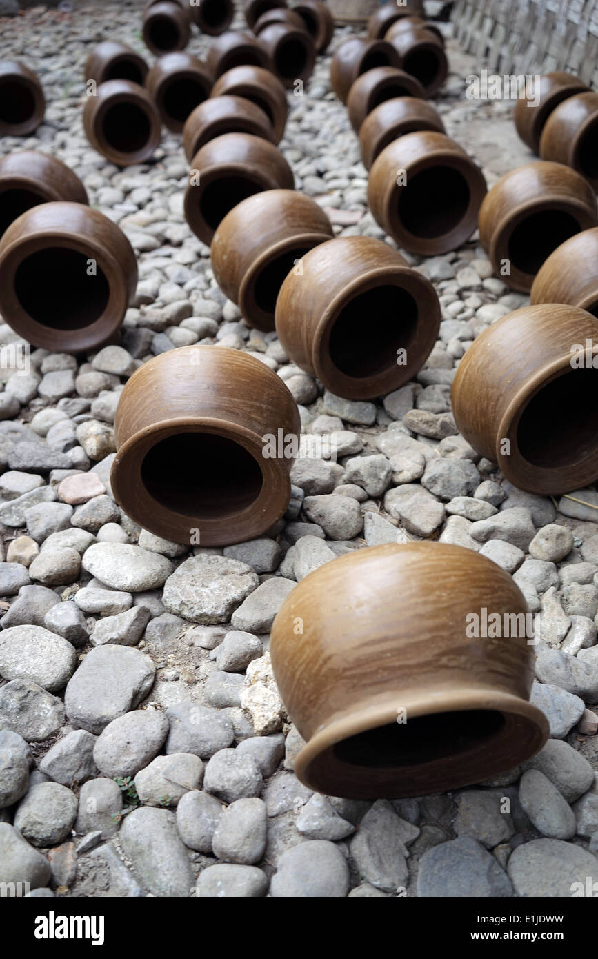 Handmade clay pots being made in Indonesia Stock Photo - Alamy