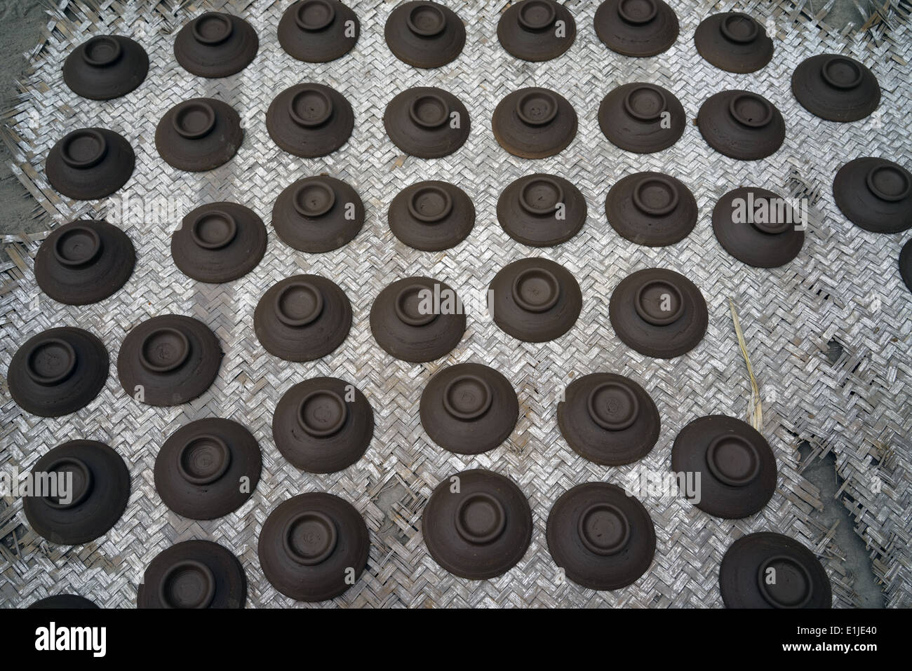 Handmade clay pots being made in Indonesia Stock Photo - Alamy