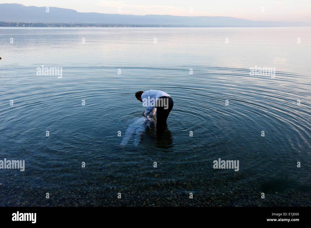Baptism in Lake LŽman Stock Photo - Alamy