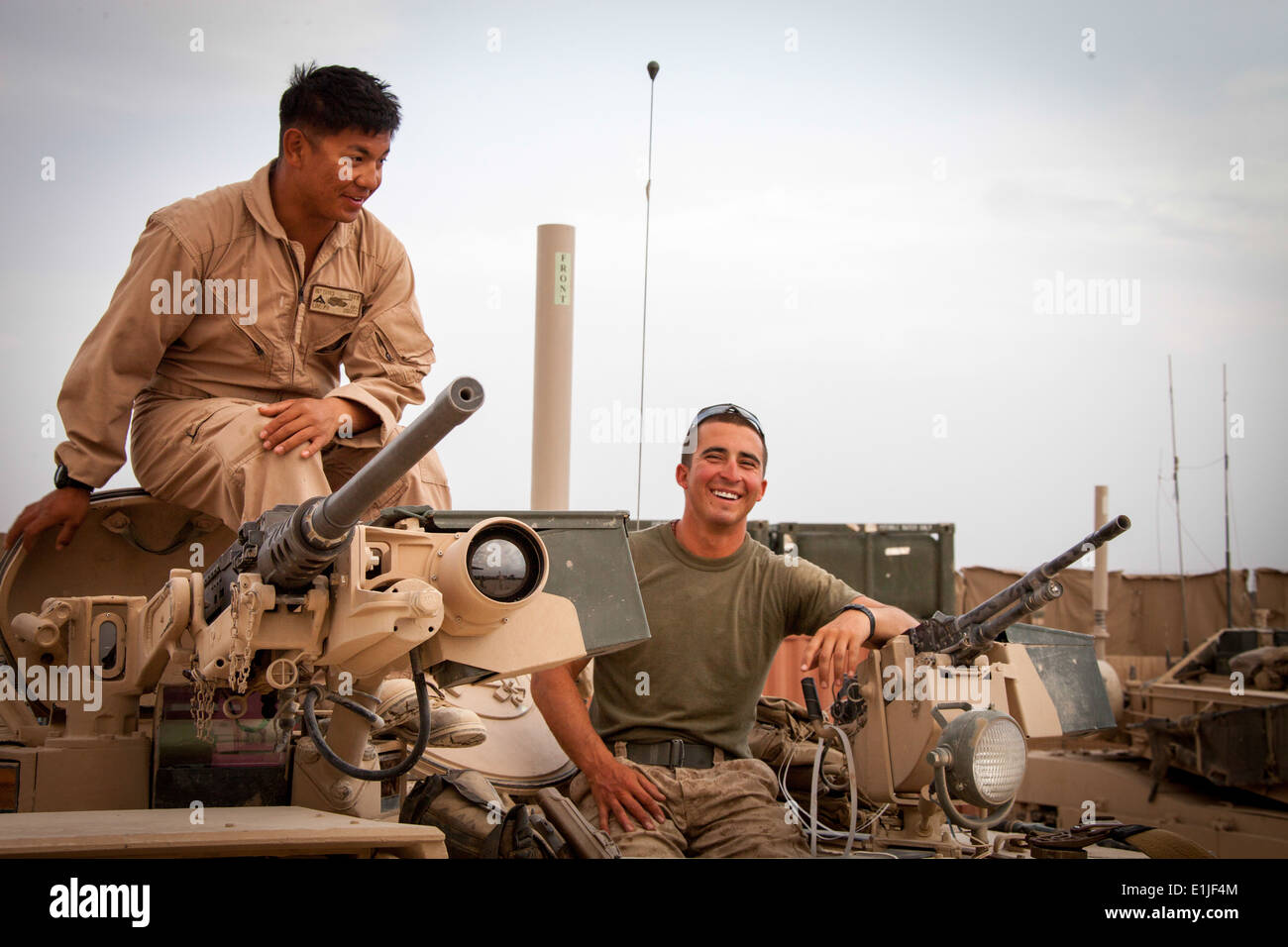 U.S. Marine Corps Lance Cpl. Phillip Lim, left, and Cpl. Brandon Baber ...