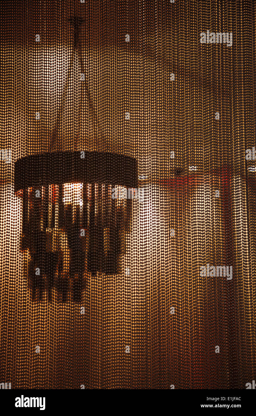 Metal Chain Screen and Chandeliers Stock Photo - Alamy