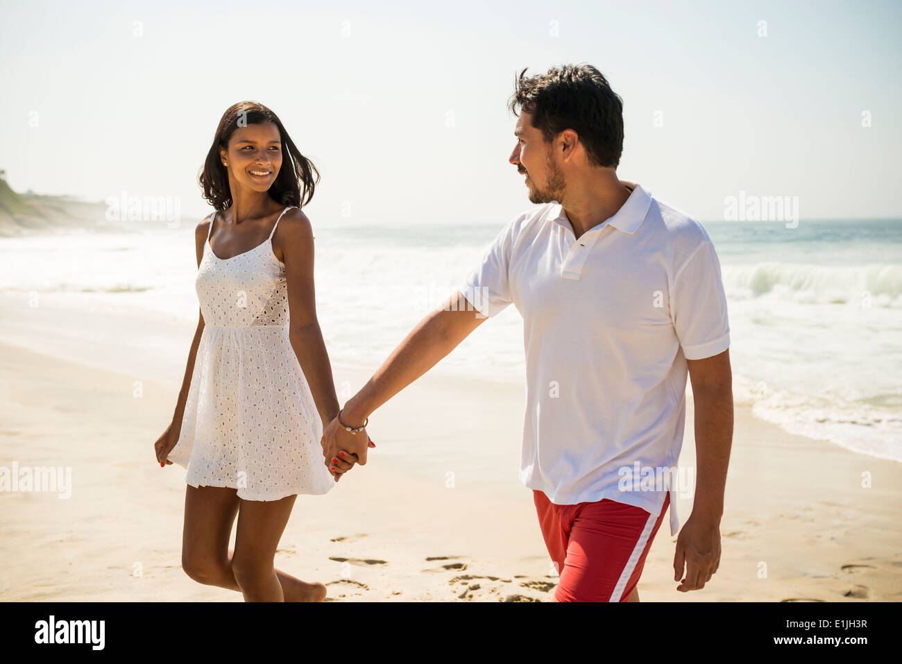 Brazil couple walking on beach hi-res stock photography and images - Alamy