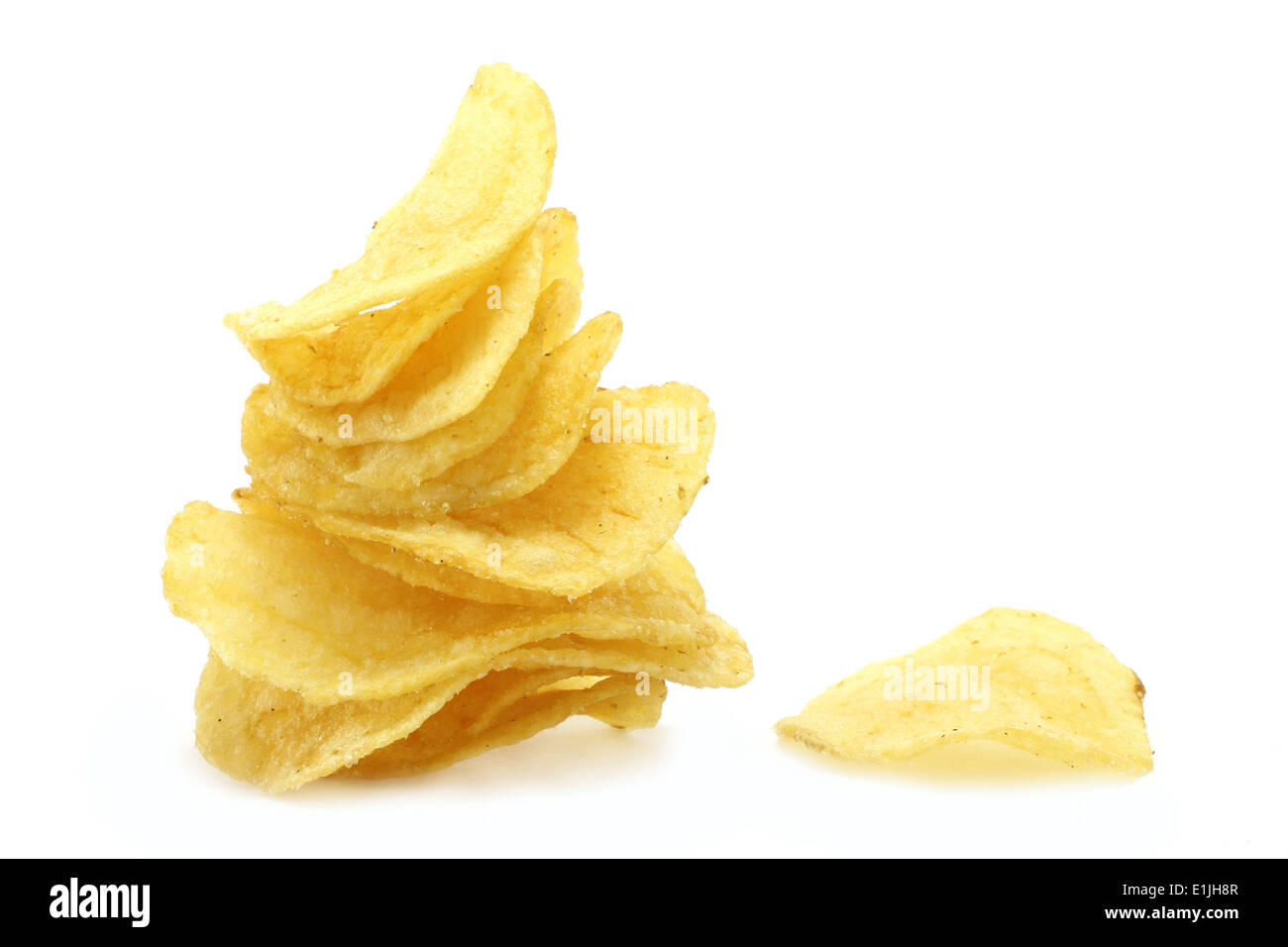 Chips pyramid and single chip on the white background Stock Photo - Alamy