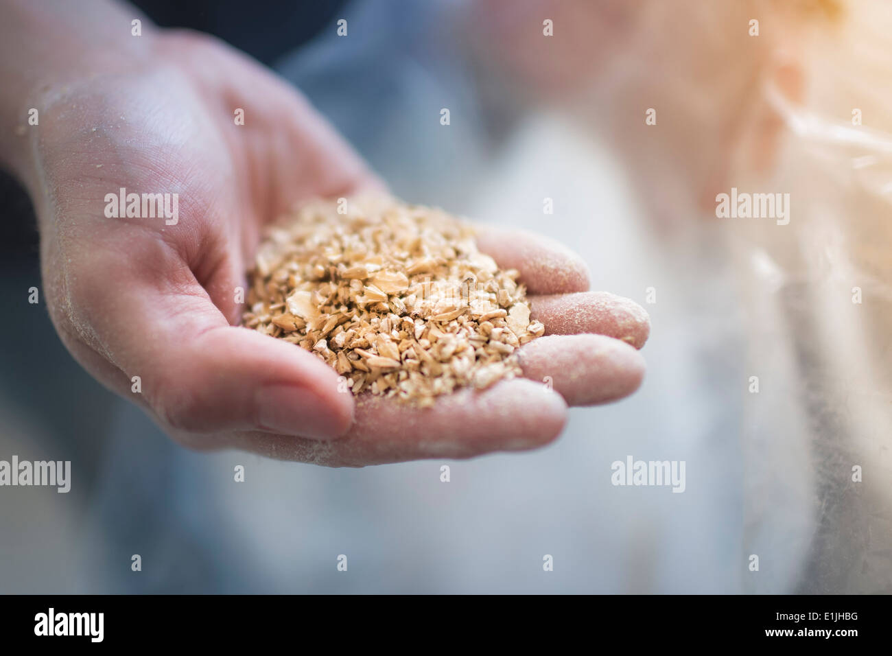 Hand holding grain hi-res stock photography and images - Alamy