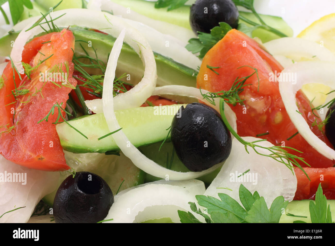 Salad close-up on the white background Stock Photo - Alamy
