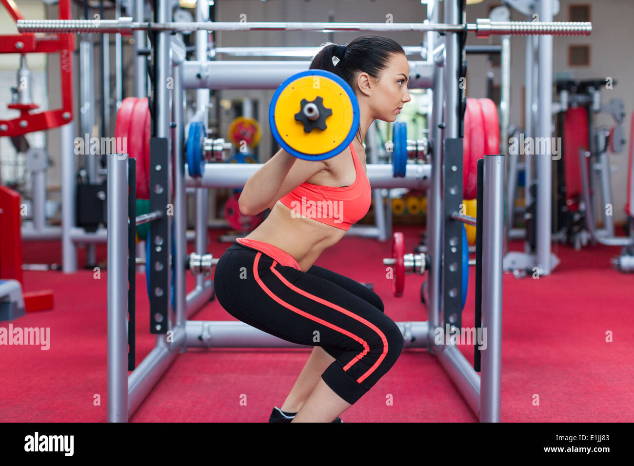 Sport woman exercising gym, fitness center Stock Photo - Alamy