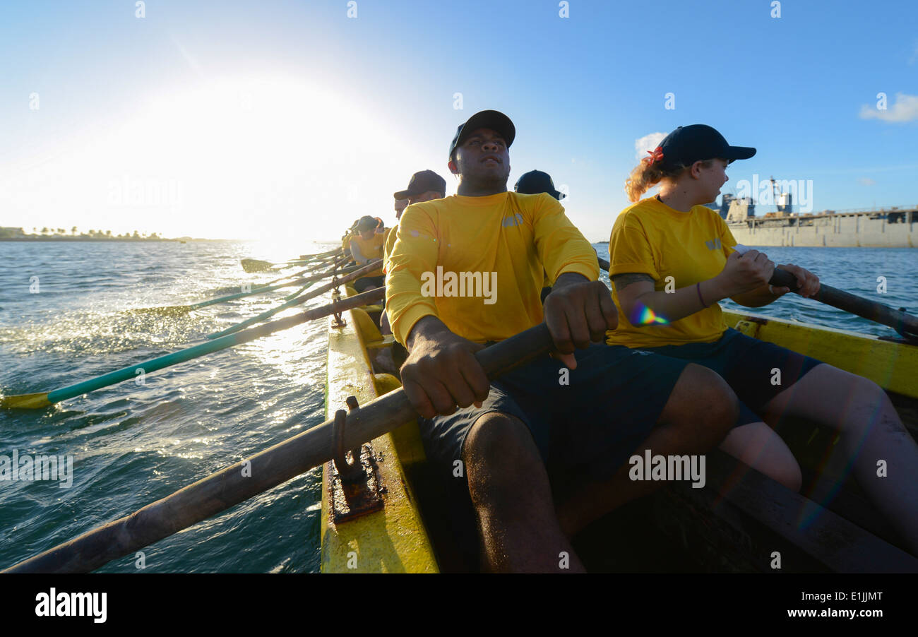 U.S. Sailors practice for a longboat race during Pacific Partnership ...