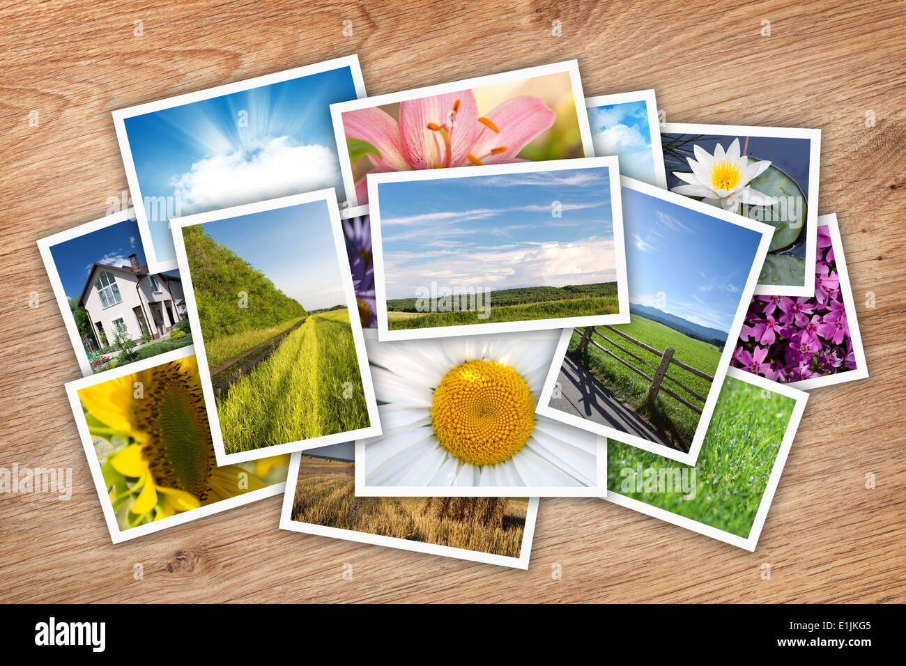 Stack of printed pictures collage on wooden table Stock Photo - Alamy