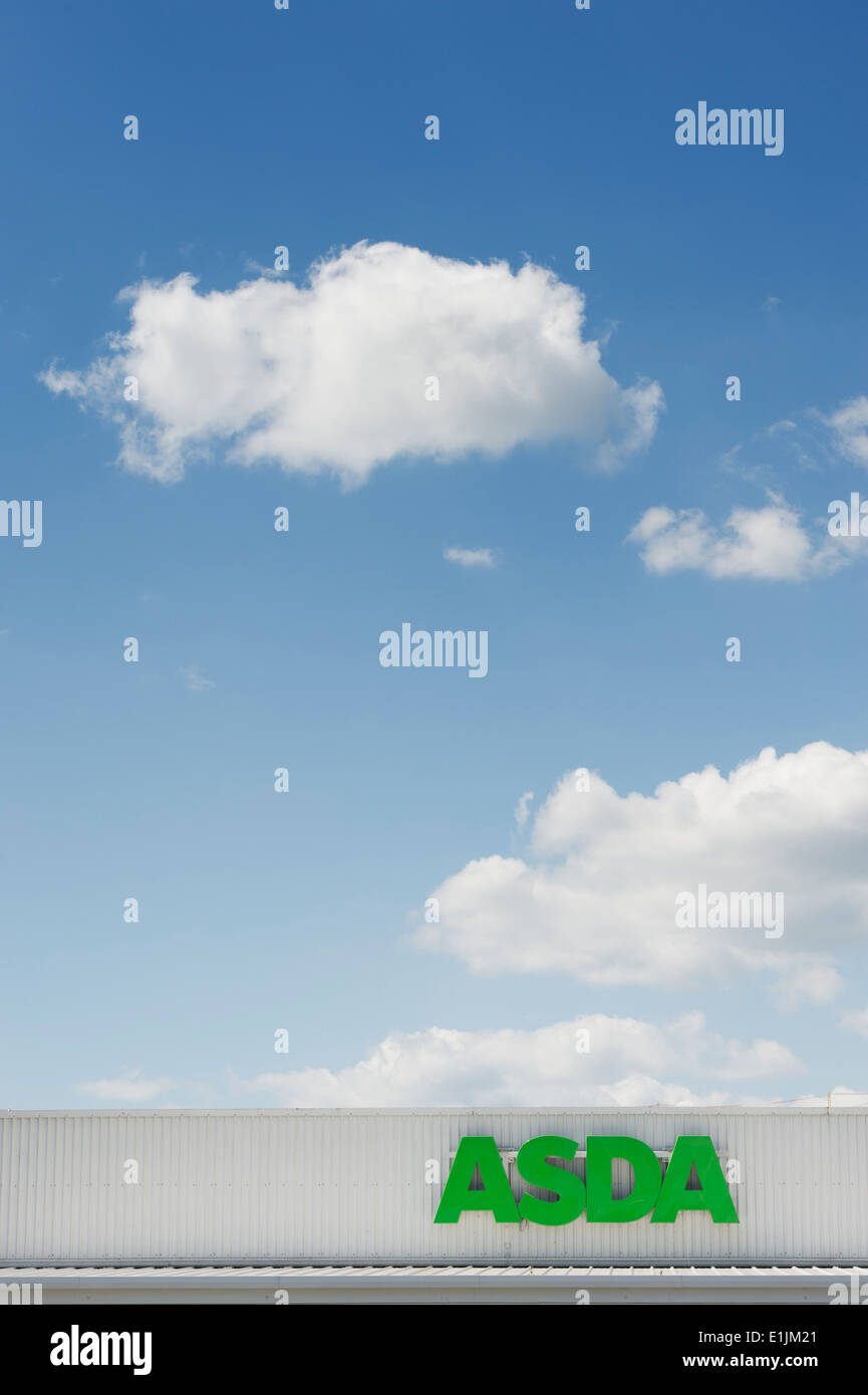 ASDA sign on superstore with blue cloudy sky Stock Photo - Alamy